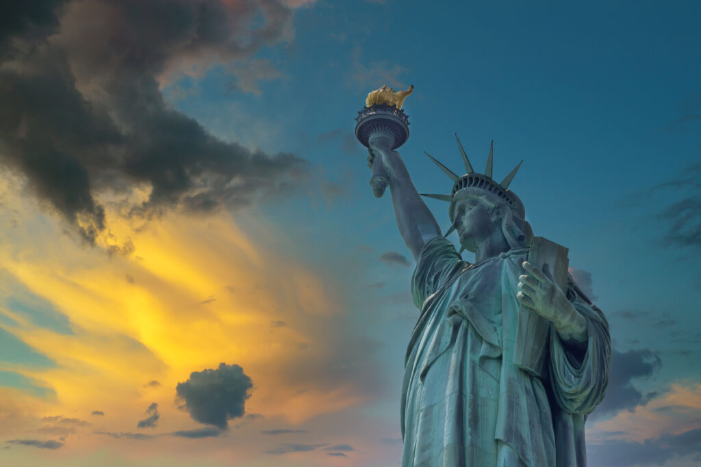 Aerial view of the Statue of Liberty at sunset in Manhattan New York ... Aerial view of the Statue of Liberty at sunset in Manhattan New York ...